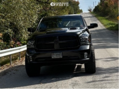 2018 Ram 1500 with 20x10 -24 Fuel Nutz and 35/12.5R20 Cooper Discoverer ...