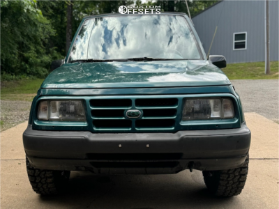 1998 Chevrolet Tracker with 15x7 -6 Vision D Window and 235/75R15 ...