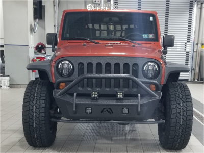 2009 Jeep Wrangler with 17x9 -12 Vision Flow and 285/70R17 Falken ...