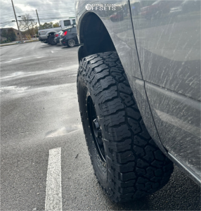 2013 Ram 2500 with 18x9 18 Method Mr305 and 35/12.5R18 Falken Wildpeak ...