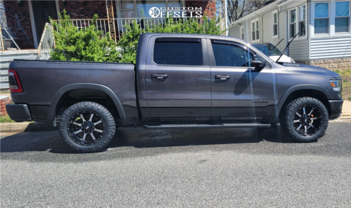 2019 Ram 1500 with 20x10 -24 Moto Metal MO970 and 33/12.5R20 Nitto ...
