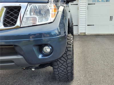 2019 Nissan Frontier with 22x10 -18 Moto Metal Mo809 and 285/45R22 ...