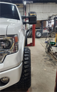 2013 Ford F-150 with 22x12 -44 TIS 565bm and 35/12.5R22 RBP Repulsor Xt ...