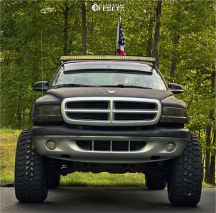 2001 Dodge Dakota with 20x12 -44 Anthem Off-Road Avenger and 35/12.5R20 ...