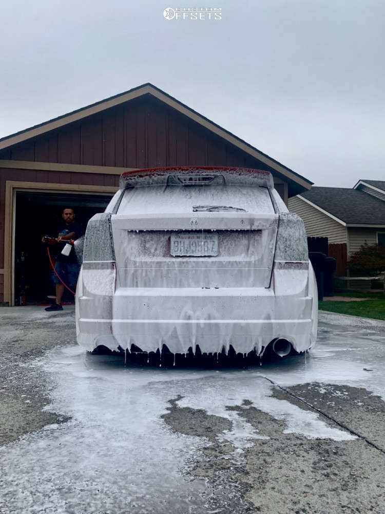 2008 Dodge Caliber with 20x9 30 Niche Invert and 245/35R20 Nitto Motivo ...