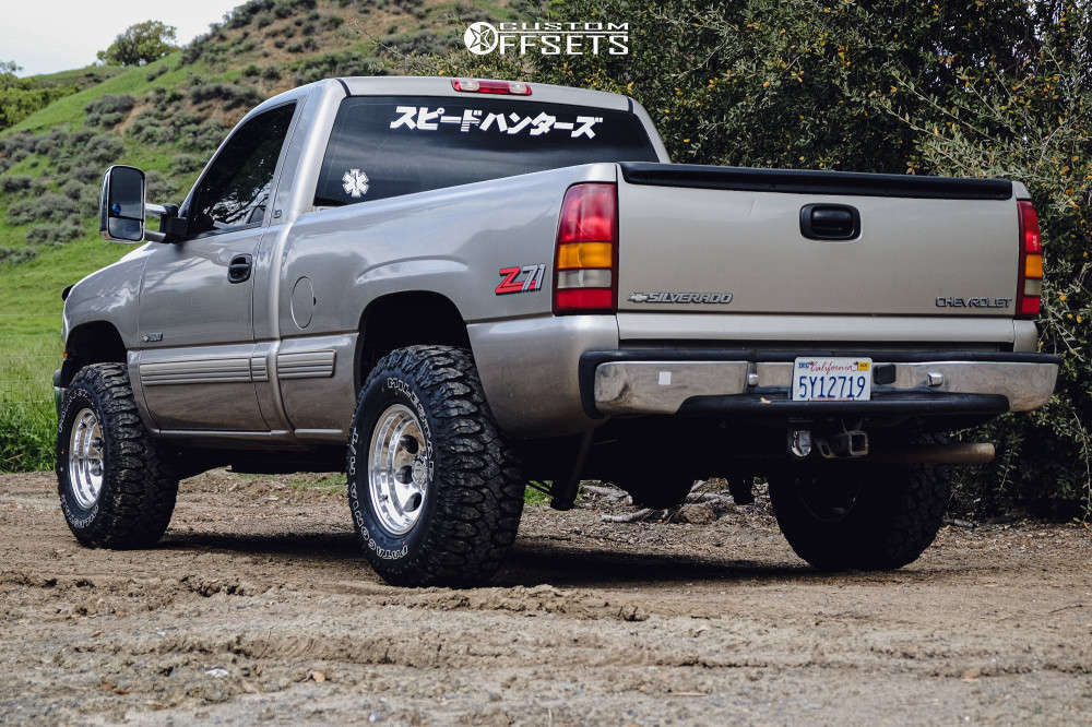 1999 Chevrolet Silverado 1500 with 16x10 -25 Pro Comp 69 and 305/70R16 ...
