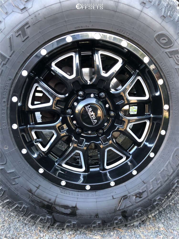 2002 Chevrolet Silverado 1500 with 18x9 -12 Ultra Hunter and 285/70R18 ...