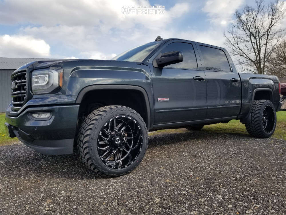 2017 GMC Sierra 1500 with 22x12 -44 TIS 544BM and 33/12.5R22 AMP Mud Terrain Attack Mt A and ...