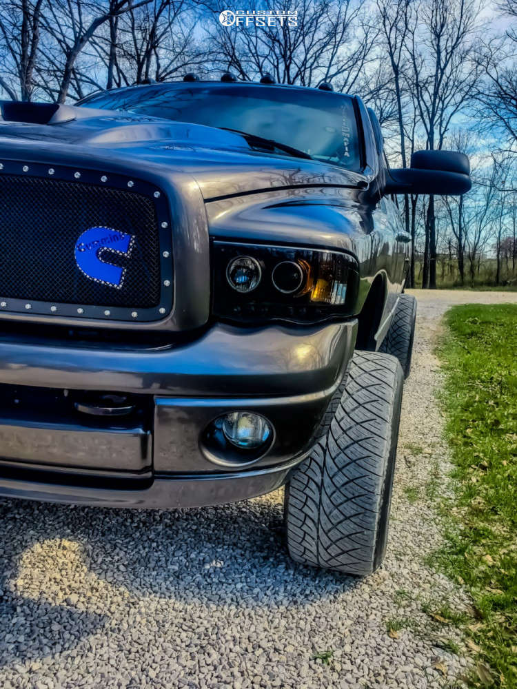 2004 Dodge Ram 3500 with 20x12 -44 Fuel Rampage and 305/50R20 Nitto ...