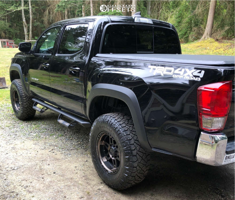 2017 Toyota Tacoma with 17x9 -12 XD Xd840 and 285/70R17 Nitto Ridge ...