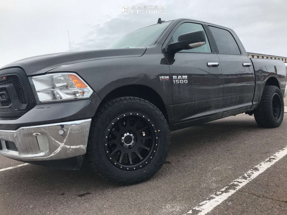 2017 Ram 1500 with 20x10 -24 Method Mr605 and 305/55R20 Falken Wildpeak ...
