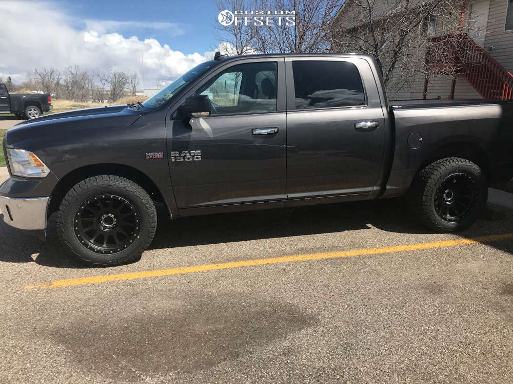 2017 Ram 1500 with 20x10 -24 Method Mr605 and 305/55R20 Falken Wildpeak ...