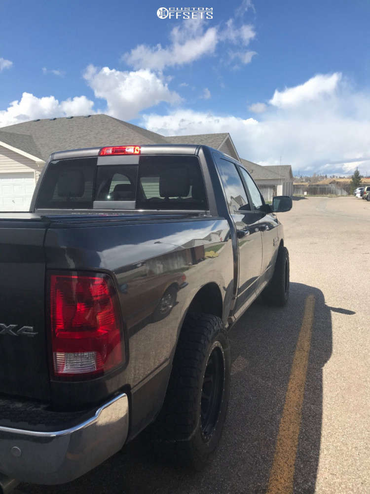 2017 Ram 1500 with 20x10 -24 Method Mr605 and 305/55R20 Falken Wildpeak ...