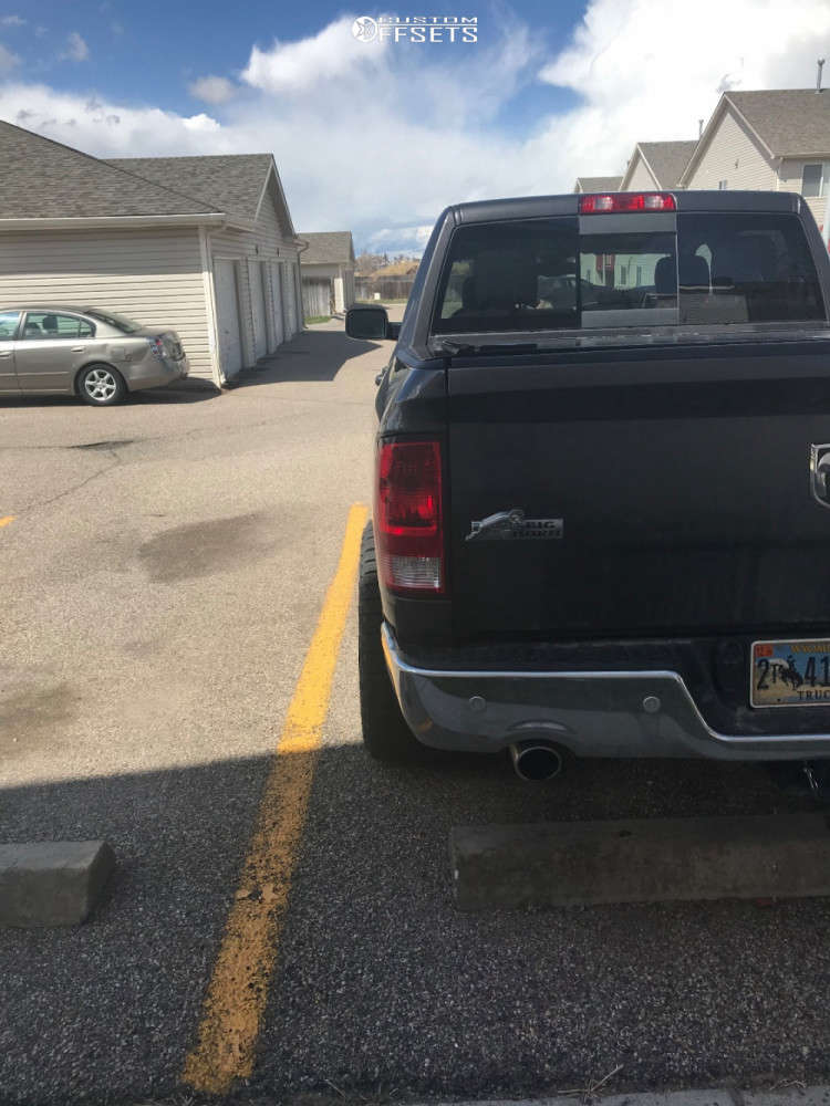 2017 Ram 1500 with 20x10 -24 Method Mr605 and 305/55R20 Falken Wildpeak ...