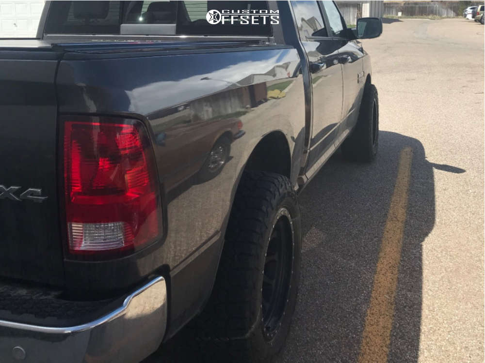 2017 Ram 1500 with 20x10 -24 Method Mr605 and 305/55R20 Falken Wildpeak ...