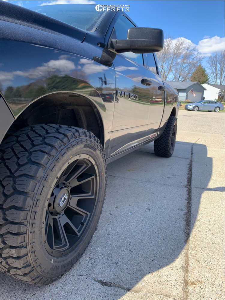 2011 Ram 1500 with 20x10 -25 Vision Rebel and 33/12.5R20 Kenda Klever R ...