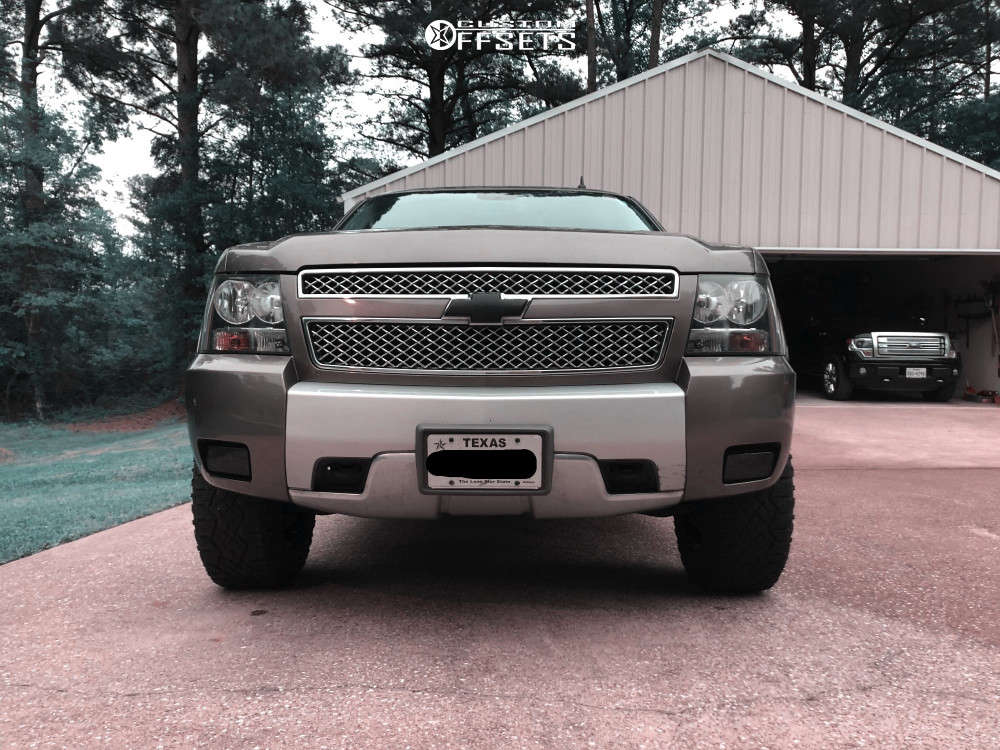 2012 Chevrolet Suburban 1500 with 18x9 0 Pro Comp Series 34 and 275 ...