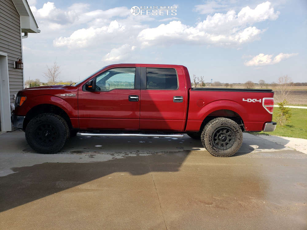 2014 Ford F-150 with 18x9 0 Pro Comp Series 32 and 305/65R18 Falken ...