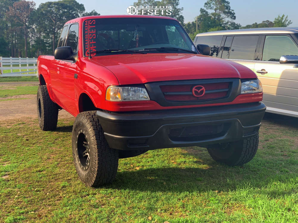 2002 Mazda B3000 with 15x8 -19 Pro Comp Series 31 and 31/10.5R15 Toyo ...