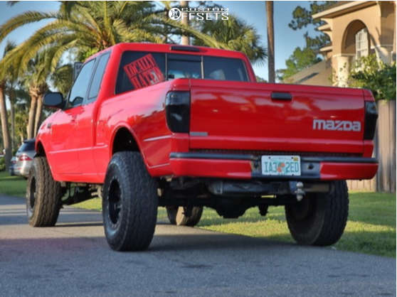 2002 Mazda B3000 with 15x8 -19 Pro Comp Series 31 and 31/10.5R15 Toyo ...