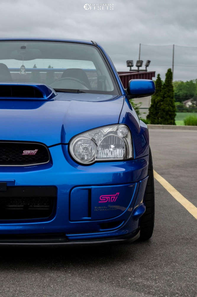 2004 Subaru WRX STI with 18x9.5 38 Enkei RPF1 and 265/35R18 Falken ...