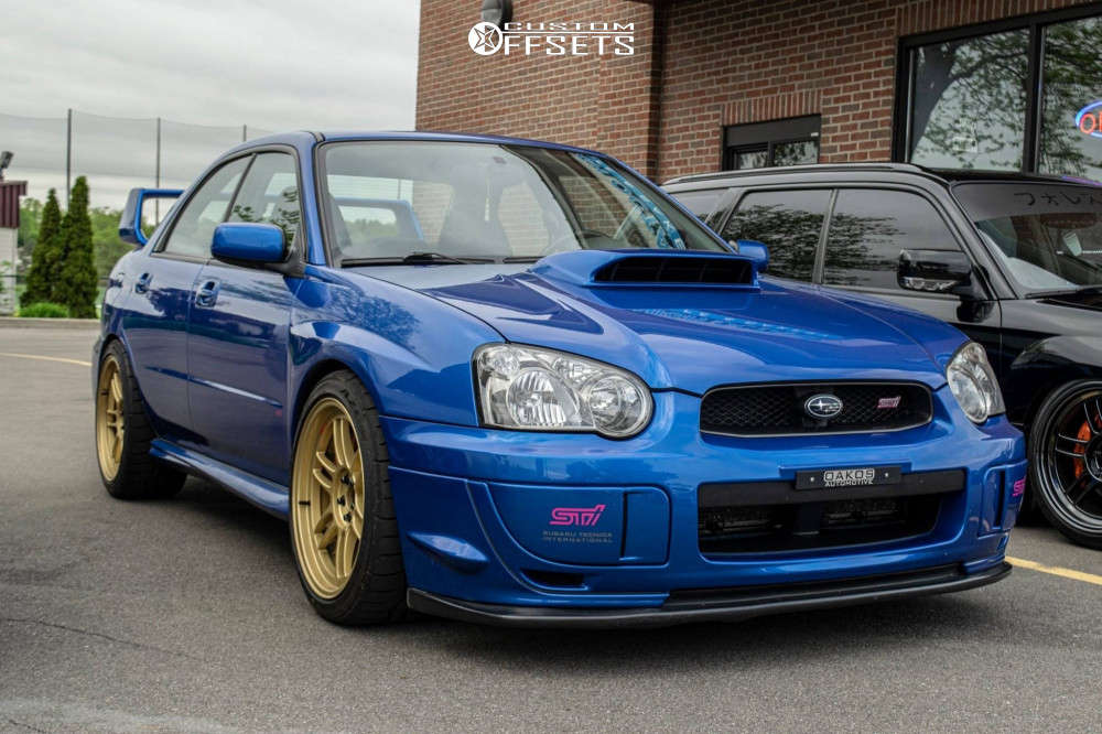 2004 Subaru WRX STI with 18x9.5 38 Enkei RPF1 and 265/45R18 Falken ...