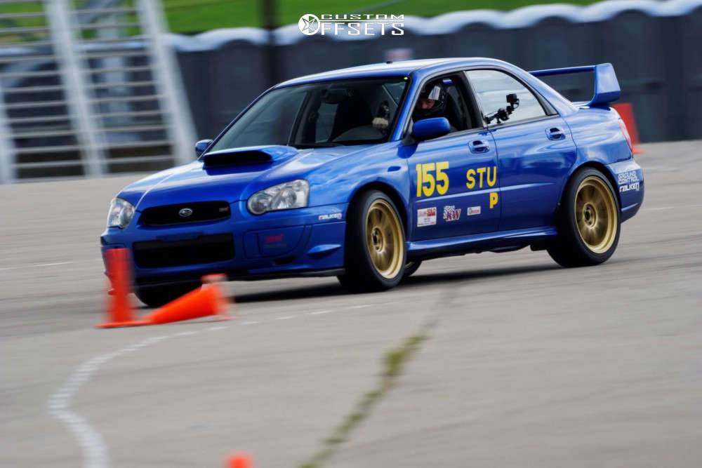 2004 Subaru WRX STI with 18x9.5 38 Enkei RPF1 and 265/45R18 Falken ...