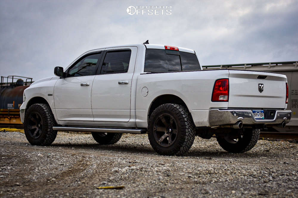 2014 Ram 1500 with 20x10 -18 Fuel Beast and 35/11.5R20 Nitto Ridge ...