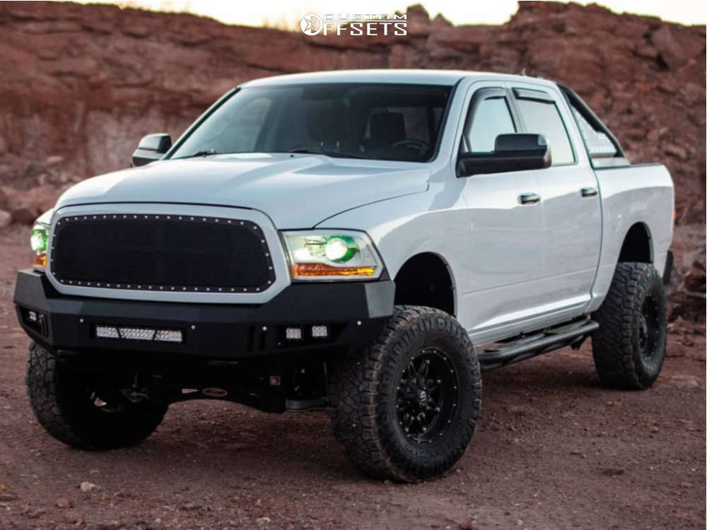 2015 Ram 1500 with 18x9 -12 Fuel Beast and 35/12.5R18 Nitto Ridge ...