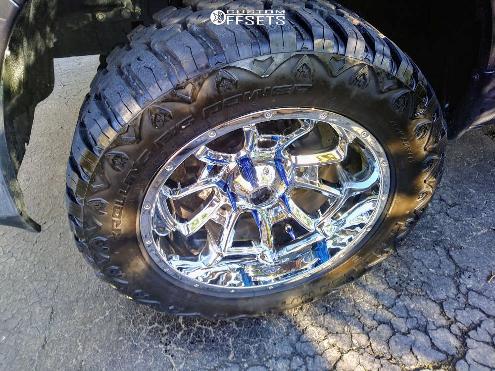 2017 Ram 1500 with 20x10 -25 Vision Bomb and 33/12.5R20 RBP Repulsor Mt ...