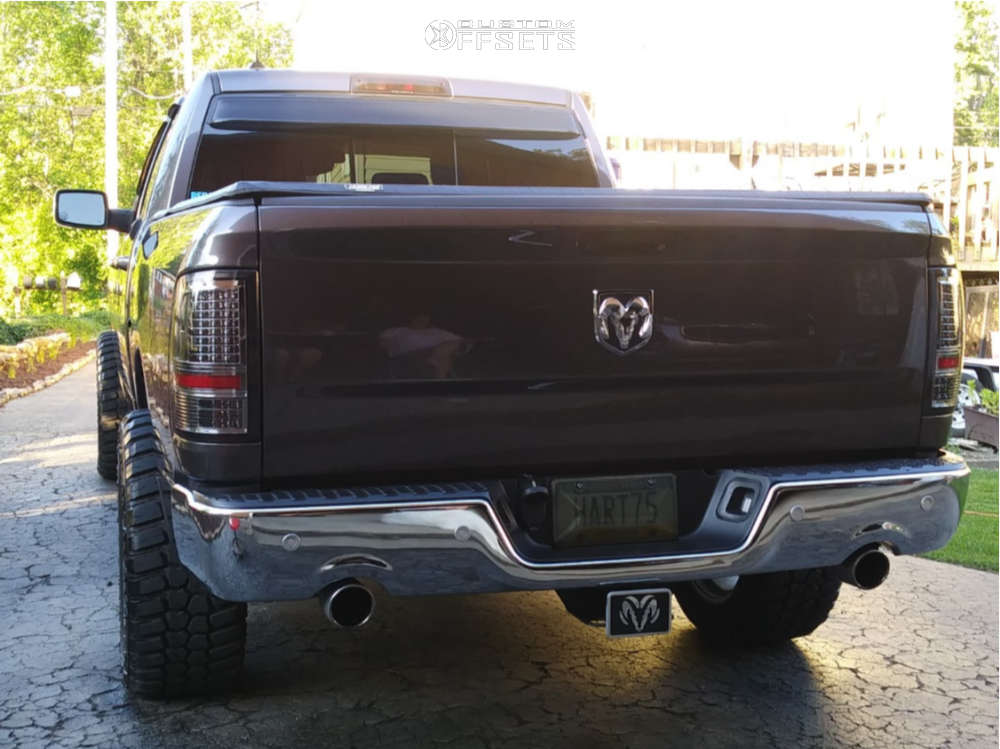 2017 Ram 1500 with 20x10 -25 Vision Bomb and 33/12.5R20 RBP Repulsor Mt ...