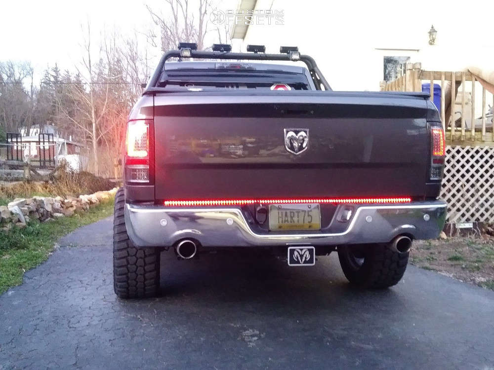 2017 Ram 1500 with 20x10 -25 Vision Bomb and 33/12.5R20 RBP Repulsor Mt ...