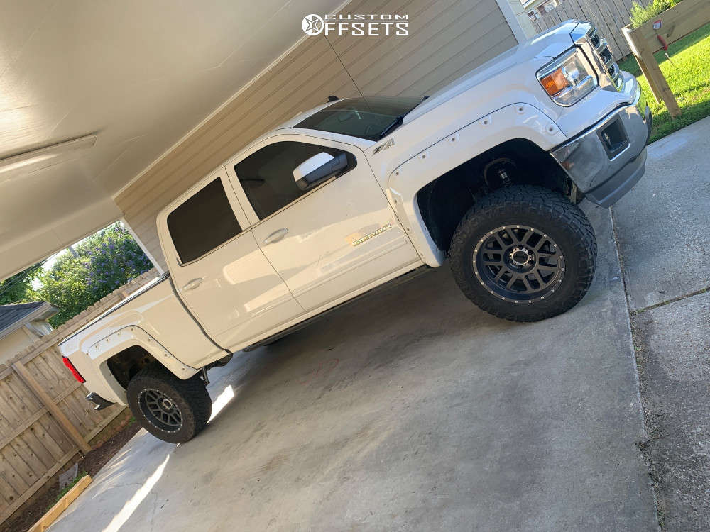 2014 GMC Sierra 1500 with 20x10 -24 Method Mr606 and 35/12.5R20 Nitto ...