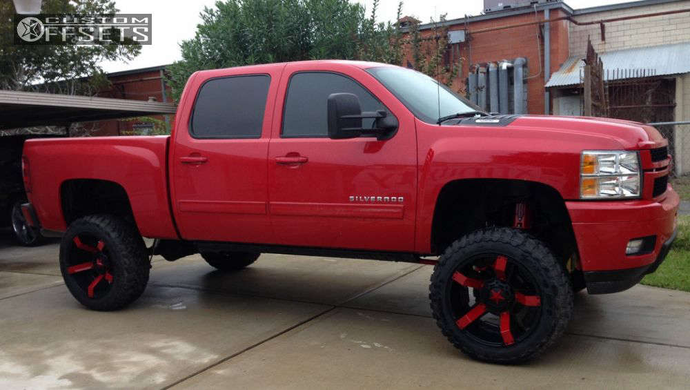 2013 Chevrolet Silverado 1500 with 22x12 -44 XD Rockstar II and 35/12 ...