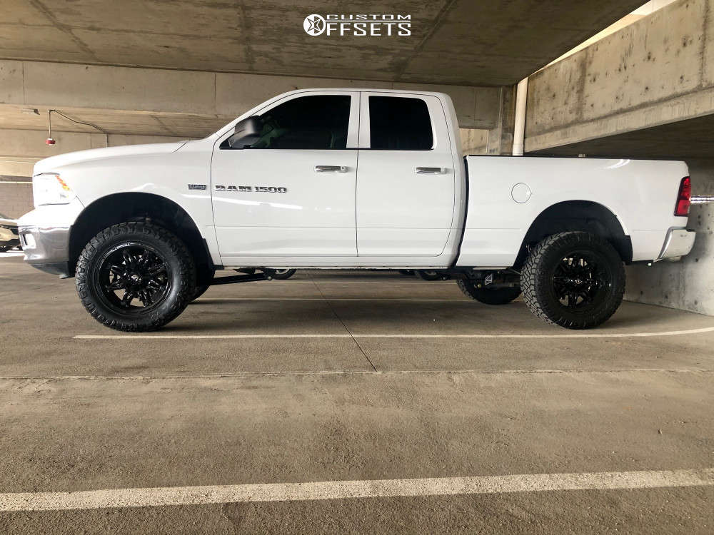 2012 Ram 1500 with 20x10 -18 Fuel Hostage and 305/55R20 Nitto Ridge ...