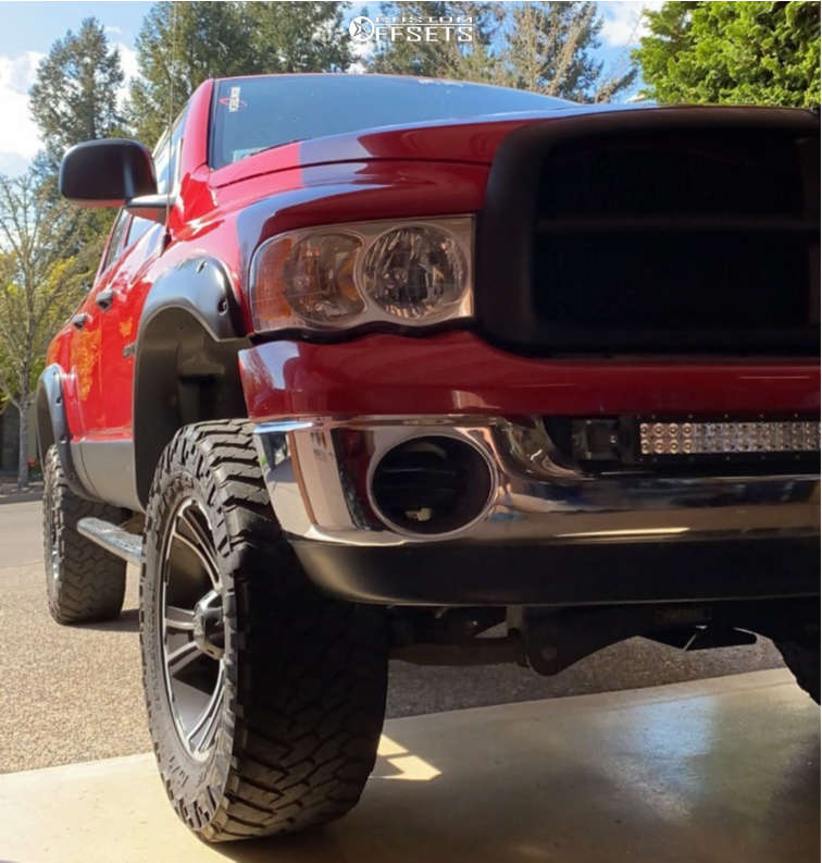 2005 Dodge Ram 1500 with 20x9 0 XD Xd801 and 35/12.5R20 Nitto Trail ...