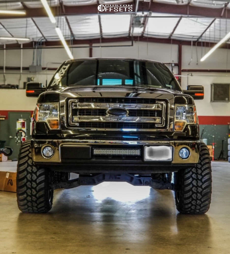 2014 Ford F-150 with 22x12 -44 TIS 544MB and 35/13.5R22 AMP Mud Terrain ...