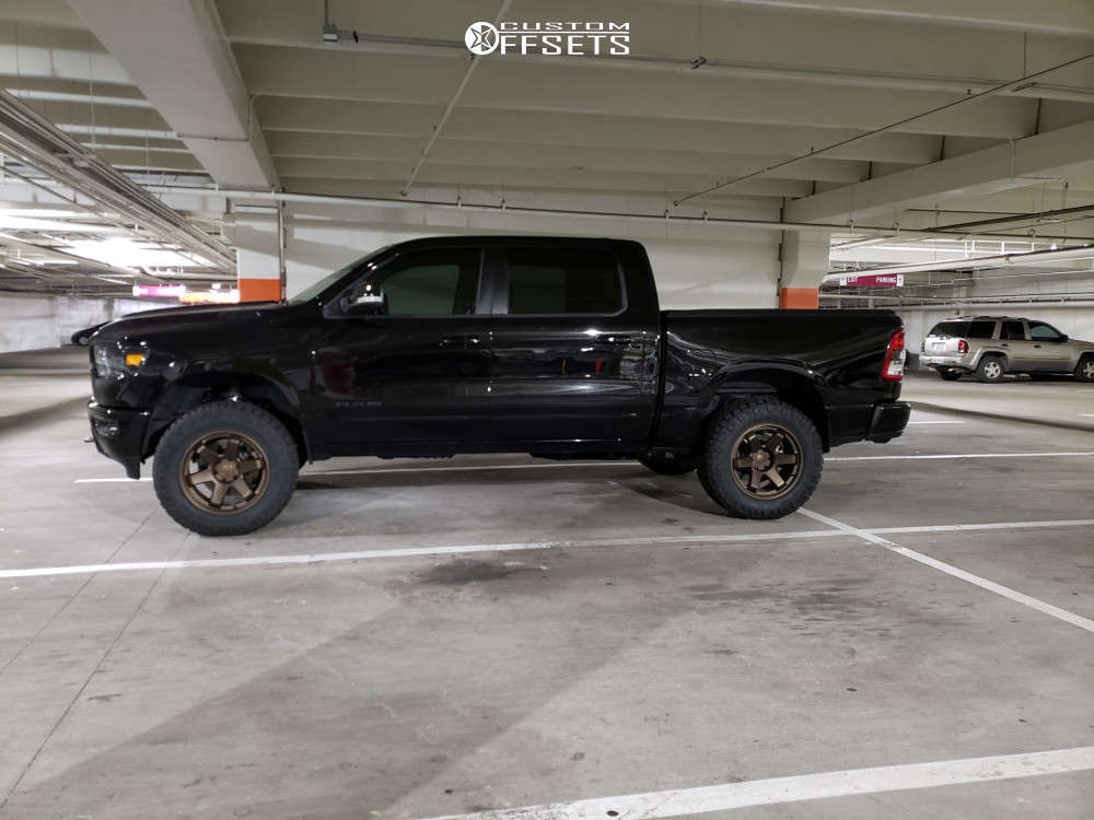 2019 Ram 1500 with 20x9.5 -18 Black Rhino Roku and 35/11.5R20 Nitto ...