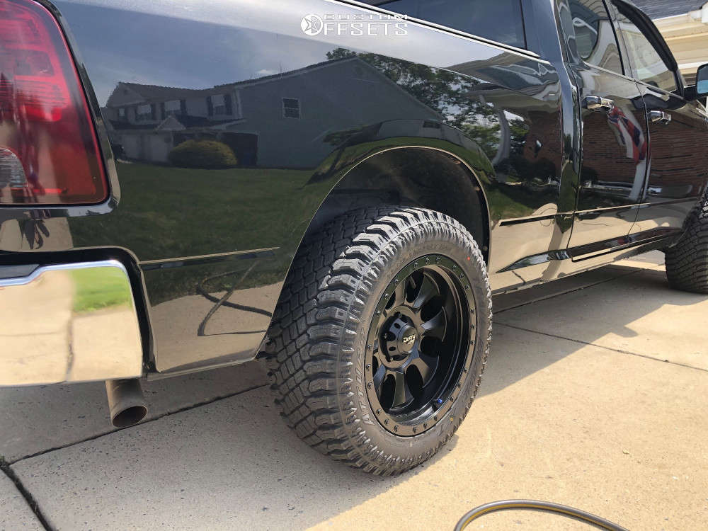 2009 Dodge Ram 1500 with 20x10 -19 Dirty Life Ironman and 33/12.5R20 ...