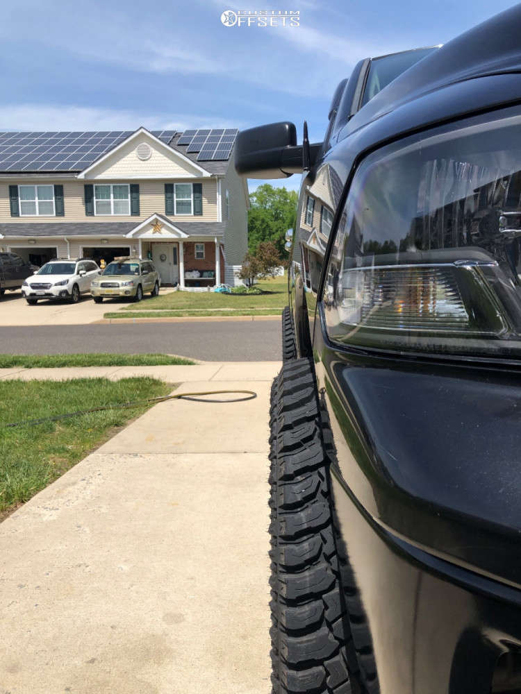2009 Dodge Ram 1500 with 20x10 -19 Dirty Life Ironman and 33/12.5R20 ...