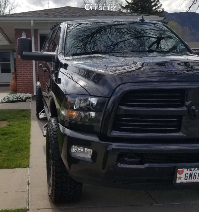 2017 Ram 3500 with 20x9 18 Helo He904 and 37/12.5R20 Falken Wildpeak ...