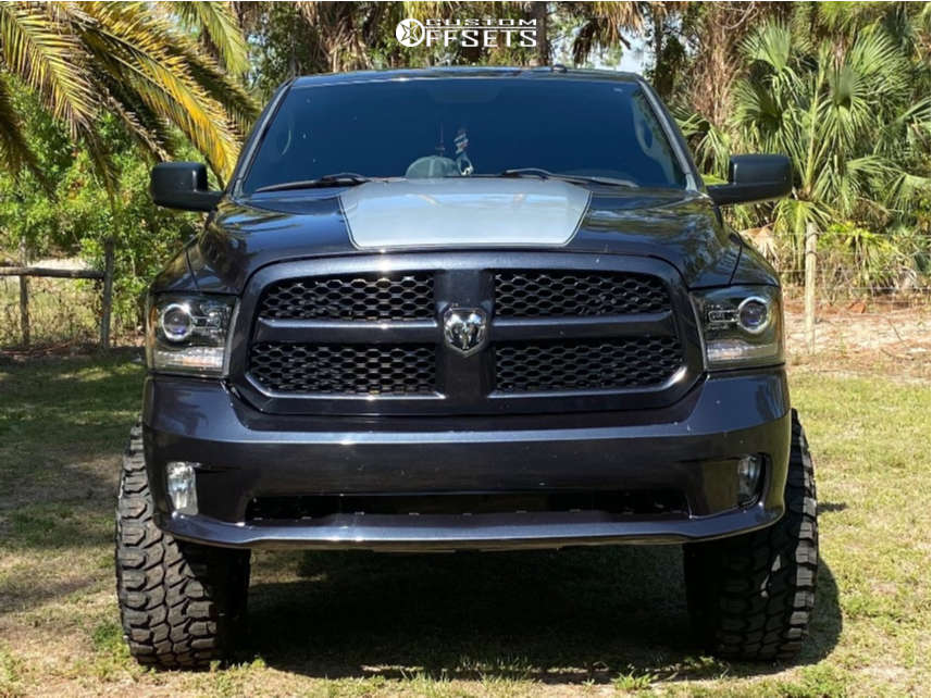 2014 Ram 1500 with 22x12 -44 TIS 544MB and 35/12.5R22 Gladiator Xcomp ...