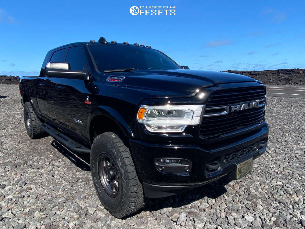2019 Ram 2500 with 18x9 18 Raceline Defender and 37/12.5R18 Toyo Tires Open Country R/T and ...