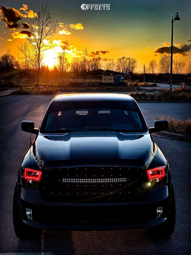 2017 Ram 1500 with 20x12 -44 American Truxx Striker and 35/12.5R20 ...