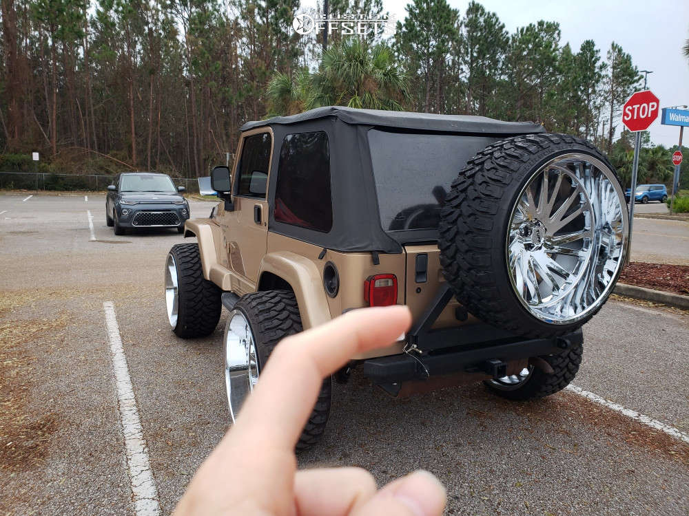 2000 Jeep Wrangler with 26x14 -72 Tuff T2A and 35/13.5R26 RBP Repulsor ...