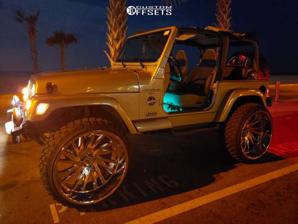 2000 Jeep Wrangler with 26x14 -72 Tuff T2A and 35/13.5R26 RBP Repulsor ...