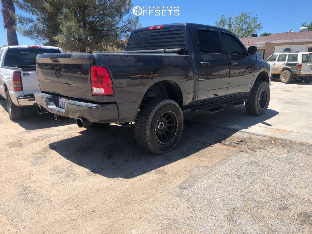 2015 Ram 1500 with 20x10 -24 Method Mr605 and 35/12.5R20 Toyo Tires ...