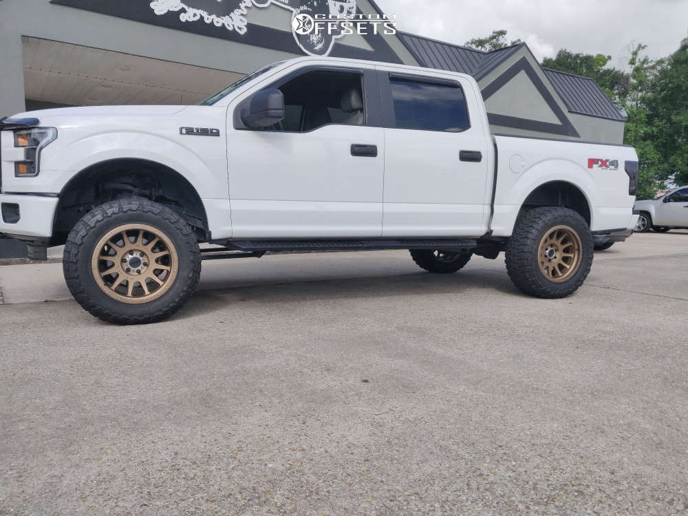 2015 Ford F-150 with 20x10 -24 Method Mr605 and 35/12.5R20 Toyo Tires ...