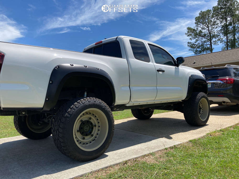 2019 Toyota Tacoma with 20x12 -44 Black Rhino Armory and 305/55R20 Toyo ...