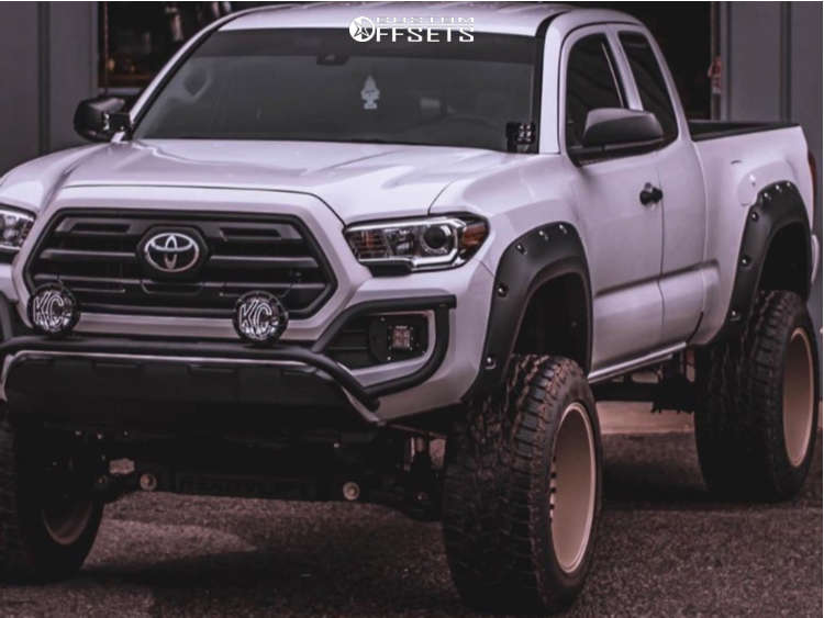 2019 Toyota Tacoma with 20x12 -44 Black Rhino Armory and 305/55R20 Toyo ...
